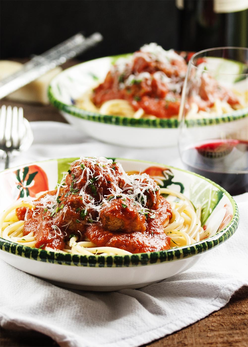 Tender Braised Italian Meatballs - Just a Little Bit of Bacon