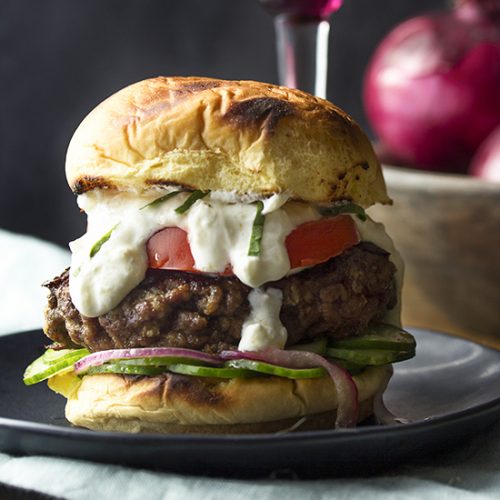 Grilled Greek Burgers with Yogurt Feta Sauce - Just a Little Bit of Bacon